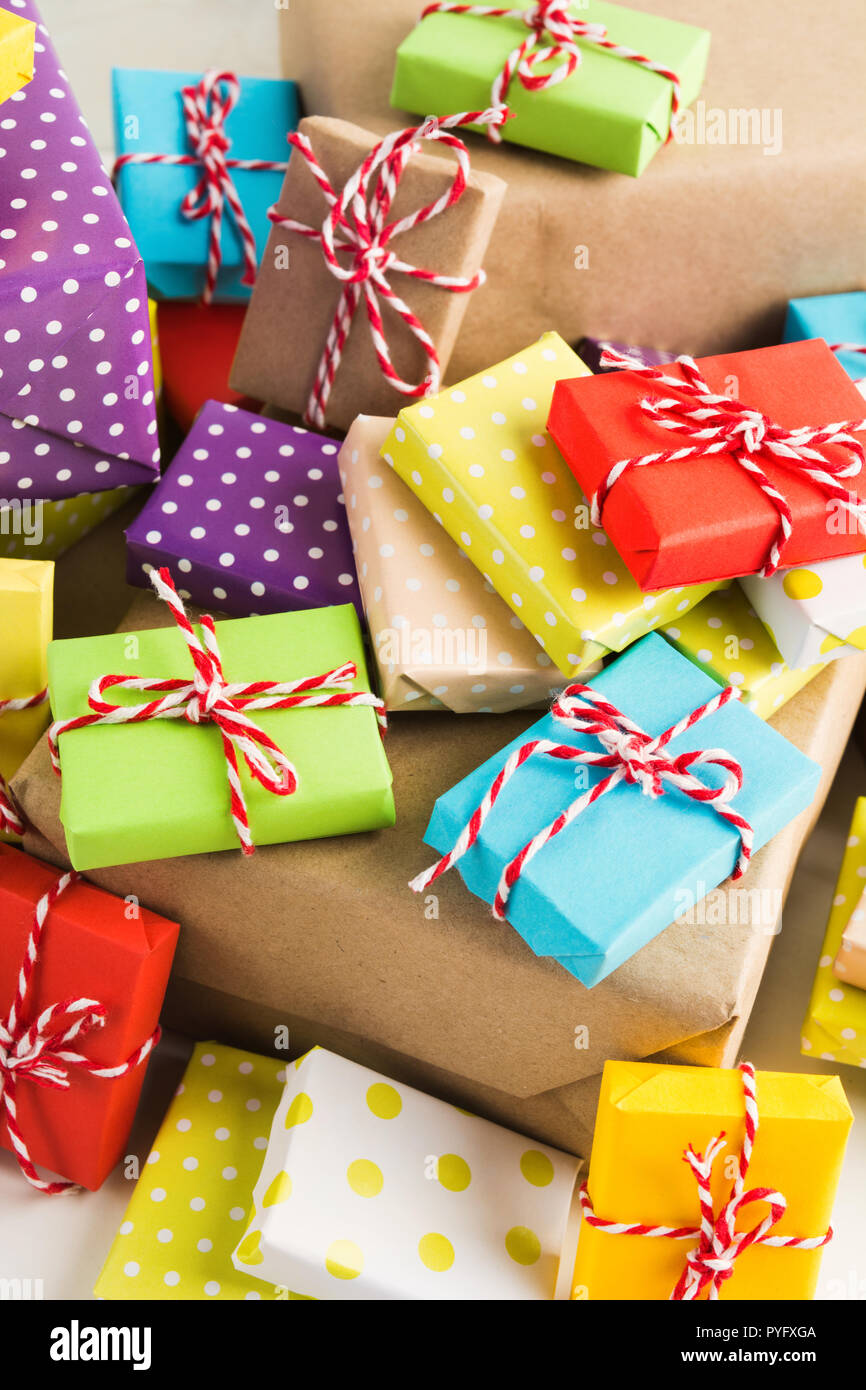 Many colorful gifts, vertical shot Stock Photo - Alamy