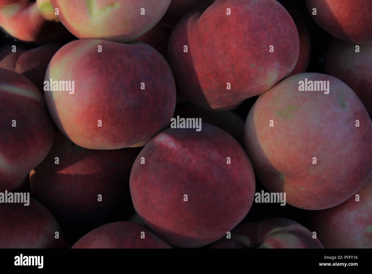 Organic peaches fruits background texture Stock Photo - Alamy