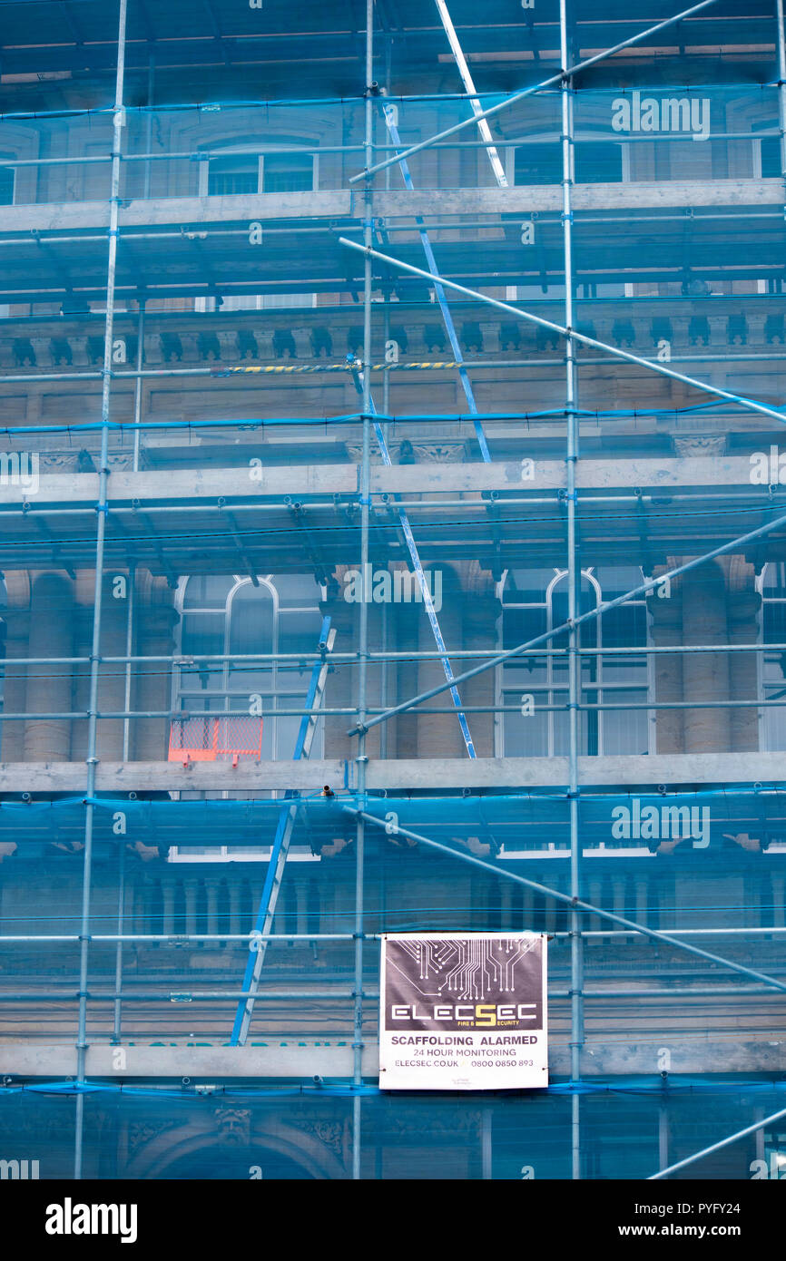 scaffolding with safety netting, renovation works being carried to ...