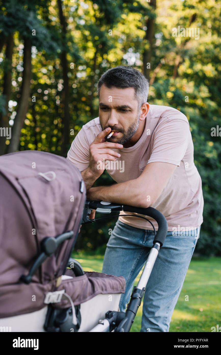Child parent smoking hi-res stock photography and images - Alamy