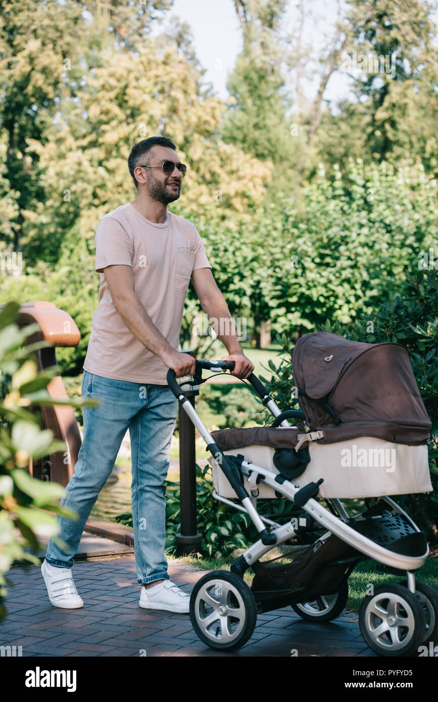Father baby buggy hi-res stock photography and images - Alamy