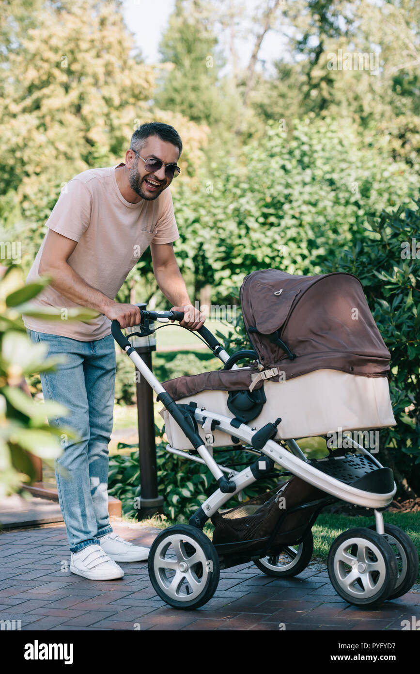 Baby walking parent camera hi-res stock photography and images - Alamy
