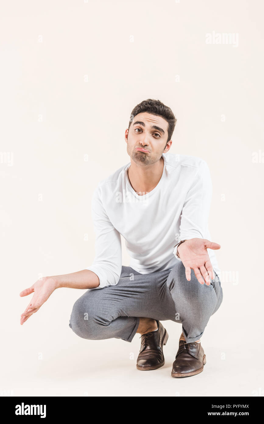 Crouching looking to camera hi-res stock photography and images - Alamy