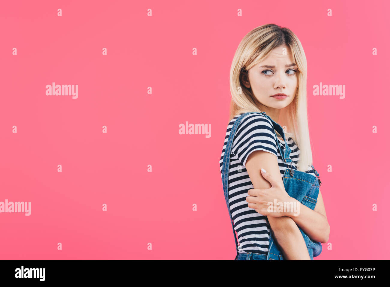 Woman hugging herself sad hi-res stock photography and images - Alamy