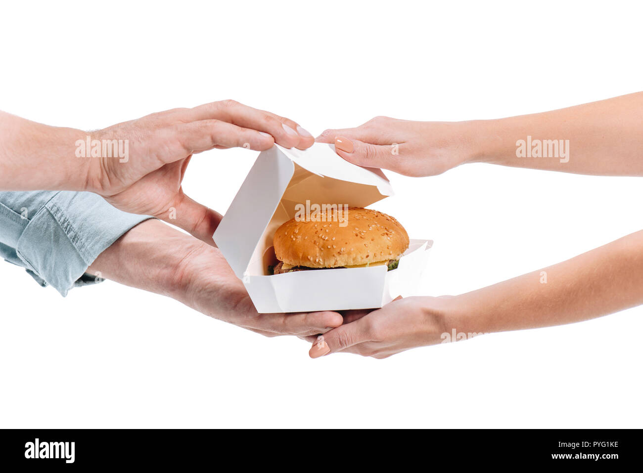 cropped image of woman open package with unhealthy fast food isolated ...