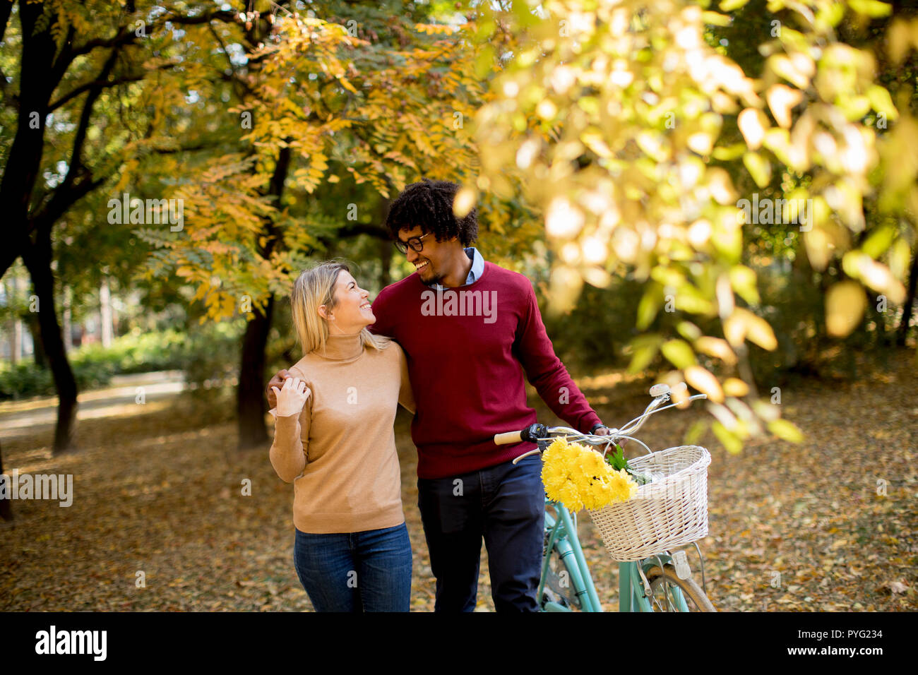 Young couple strolling autumn park hi-res stock photography and images ...