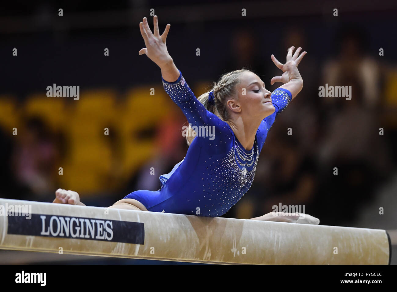 Doha, Qatar. 27th Oct, 2018. RILEY MCCUSKER competes on the balance ...