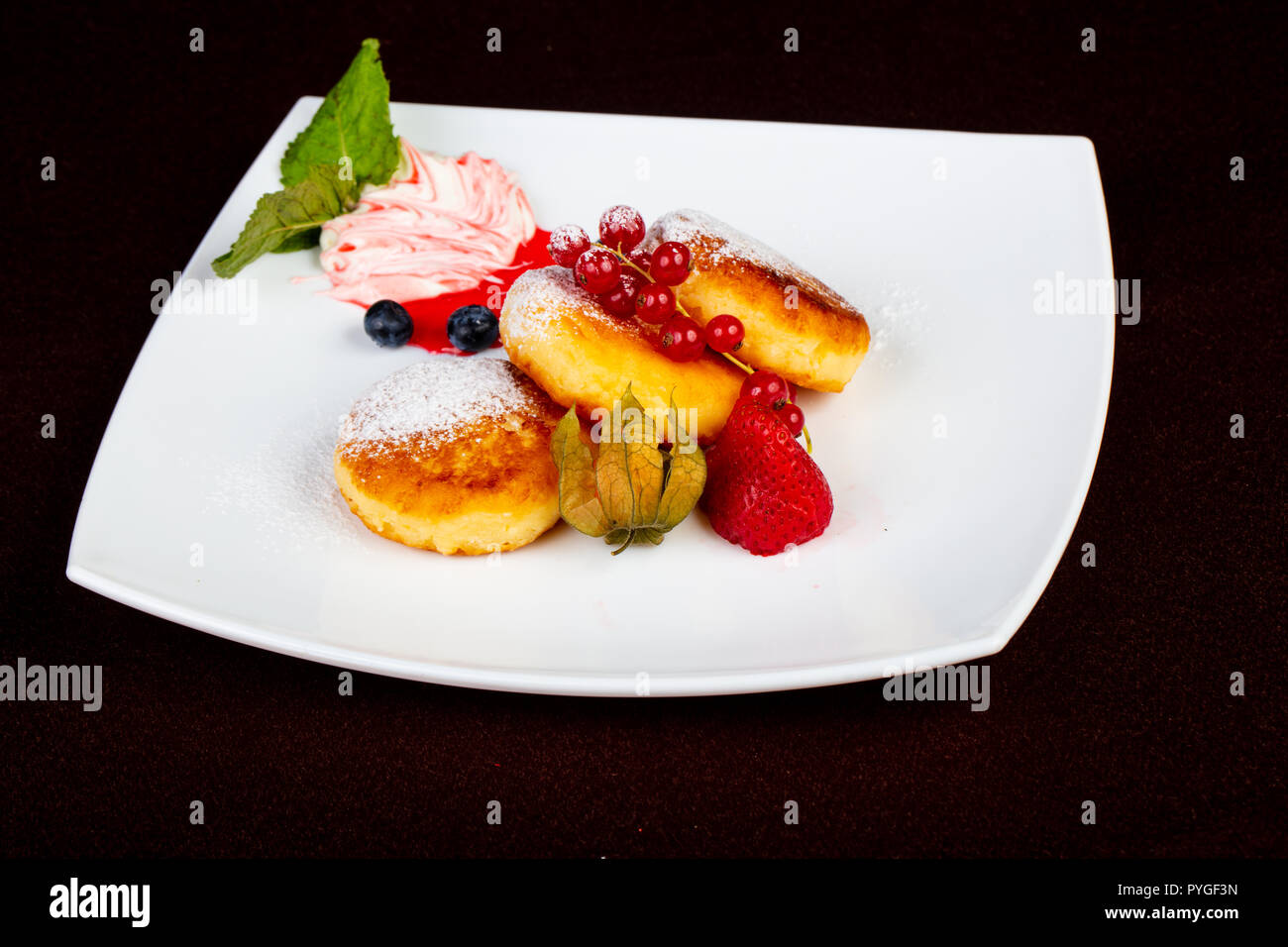 Cottage Cheese pan cakes with berries Stock Photo - Alamy