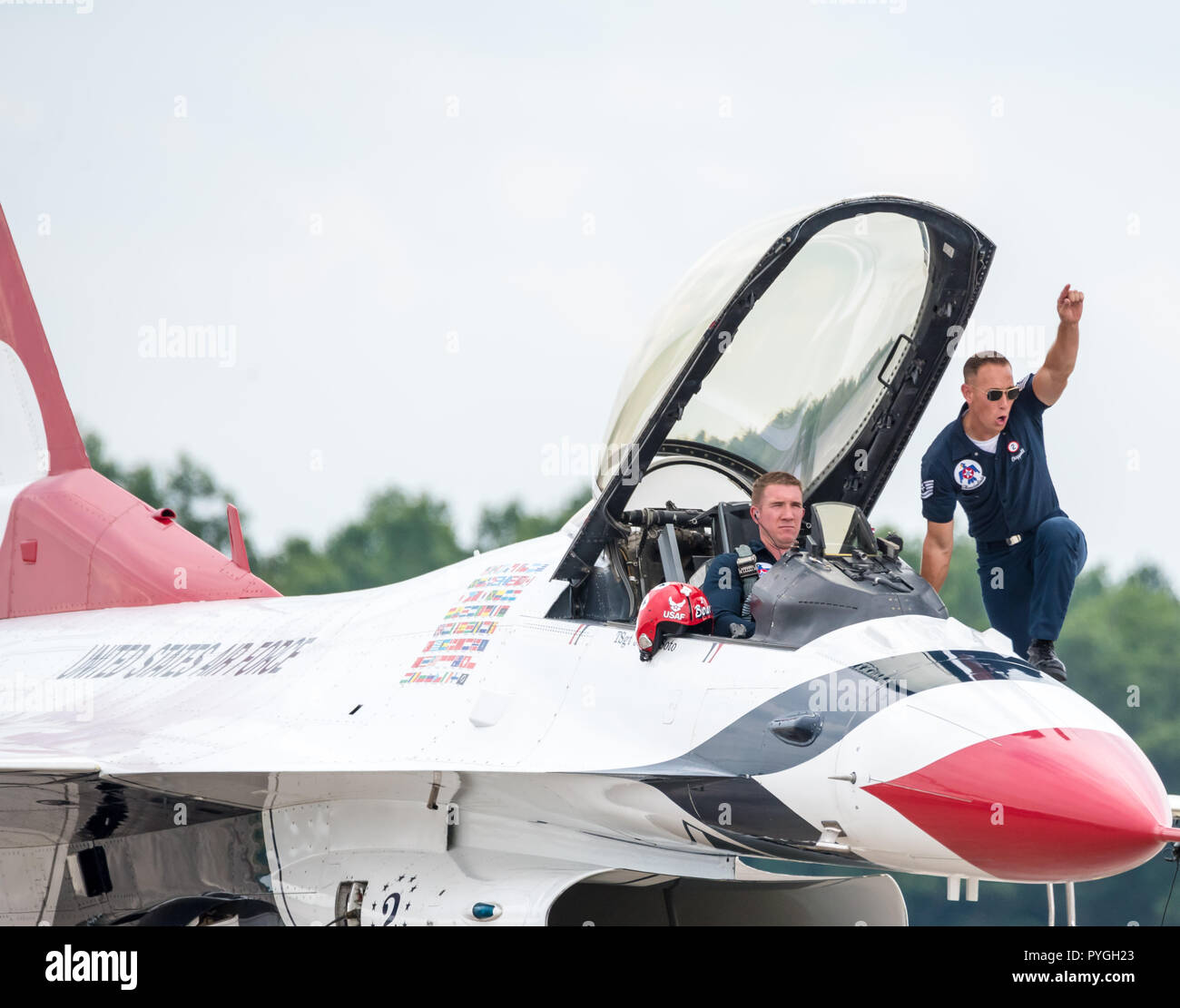 USAF Thunderbirds pilot and ground crew during the preflight check ...