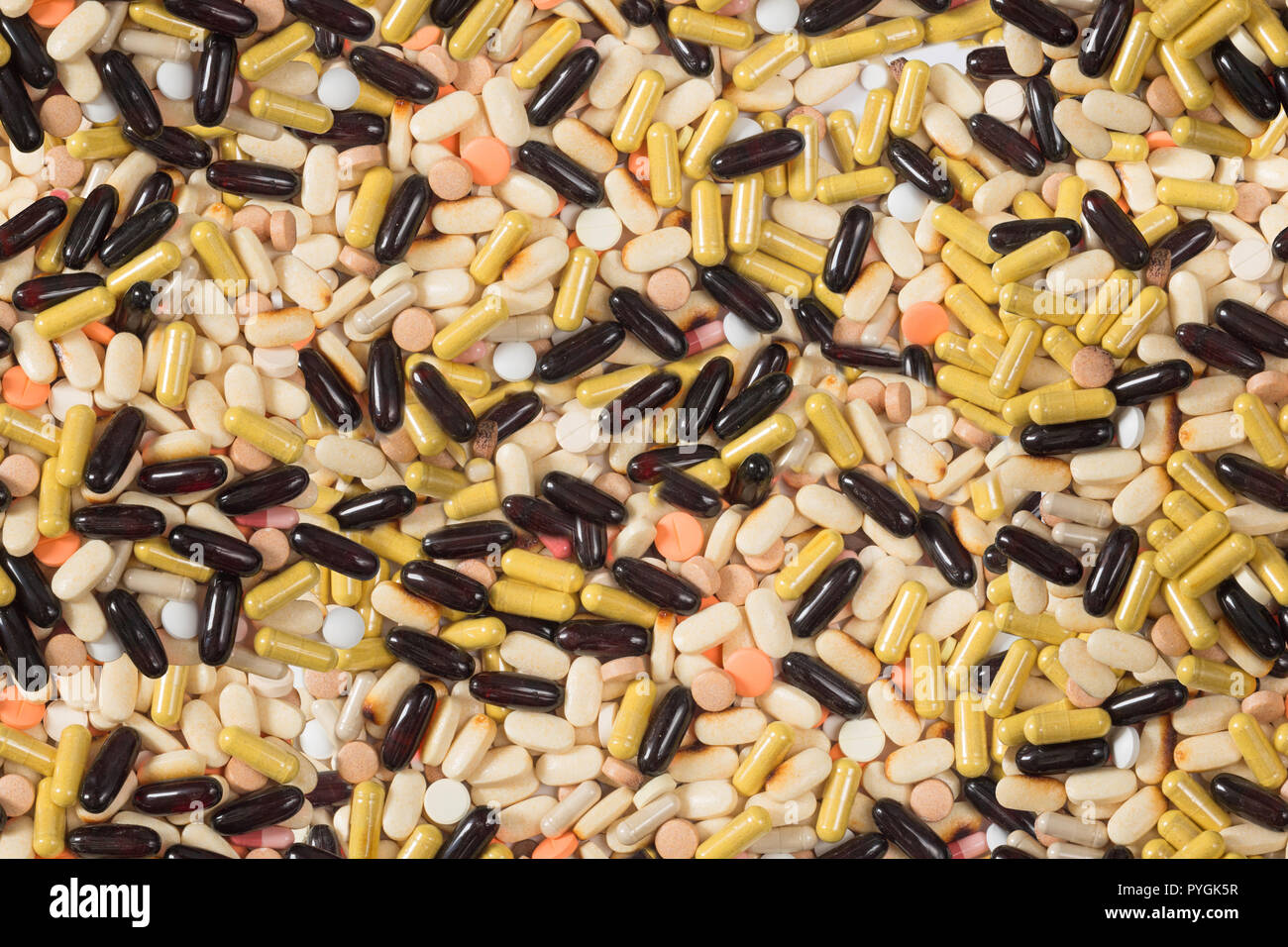 Many different colorful medication and pills from above seamless ...