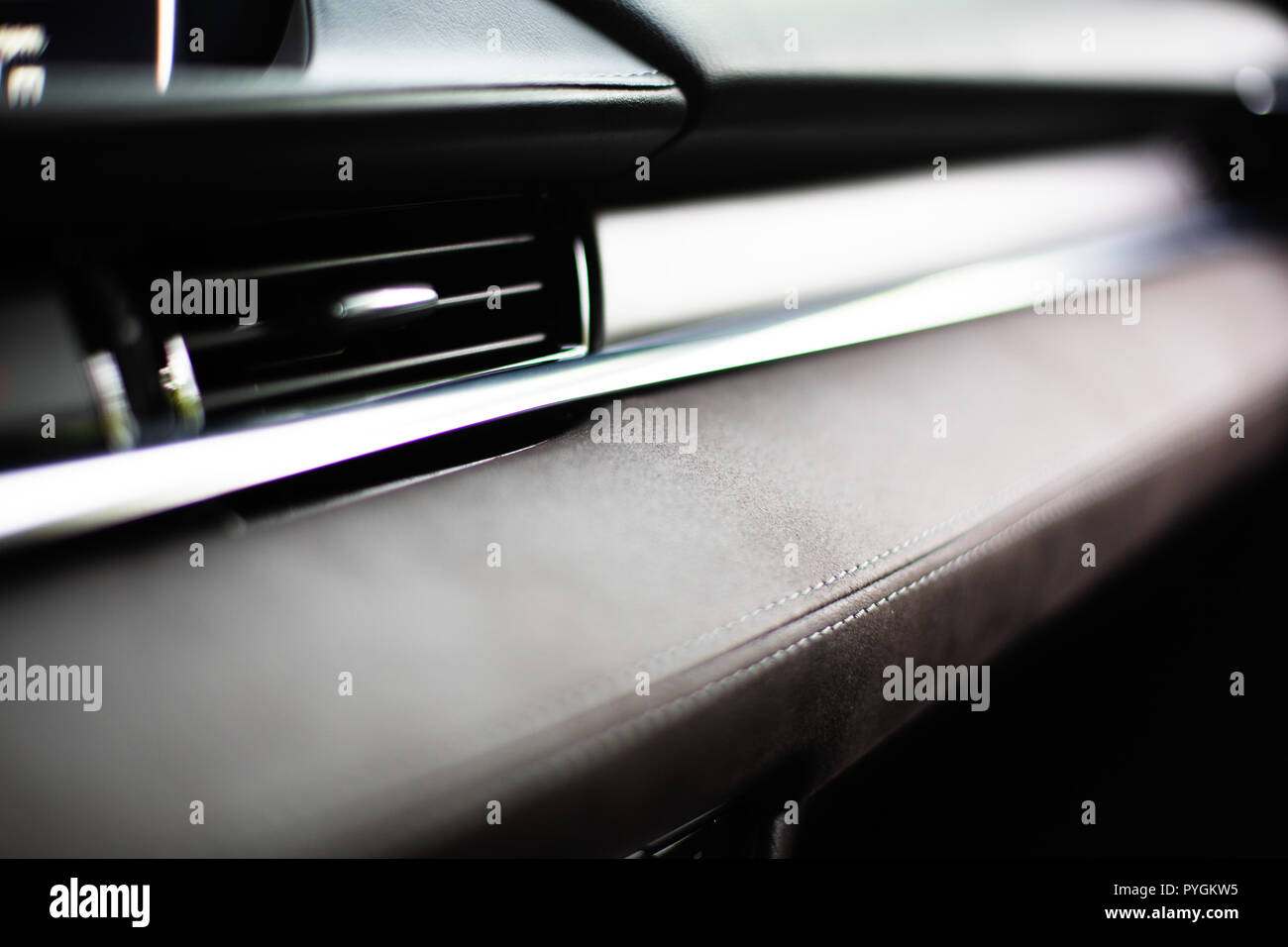 Car inside. New Modern interior of premium car with leather seats. Red ...