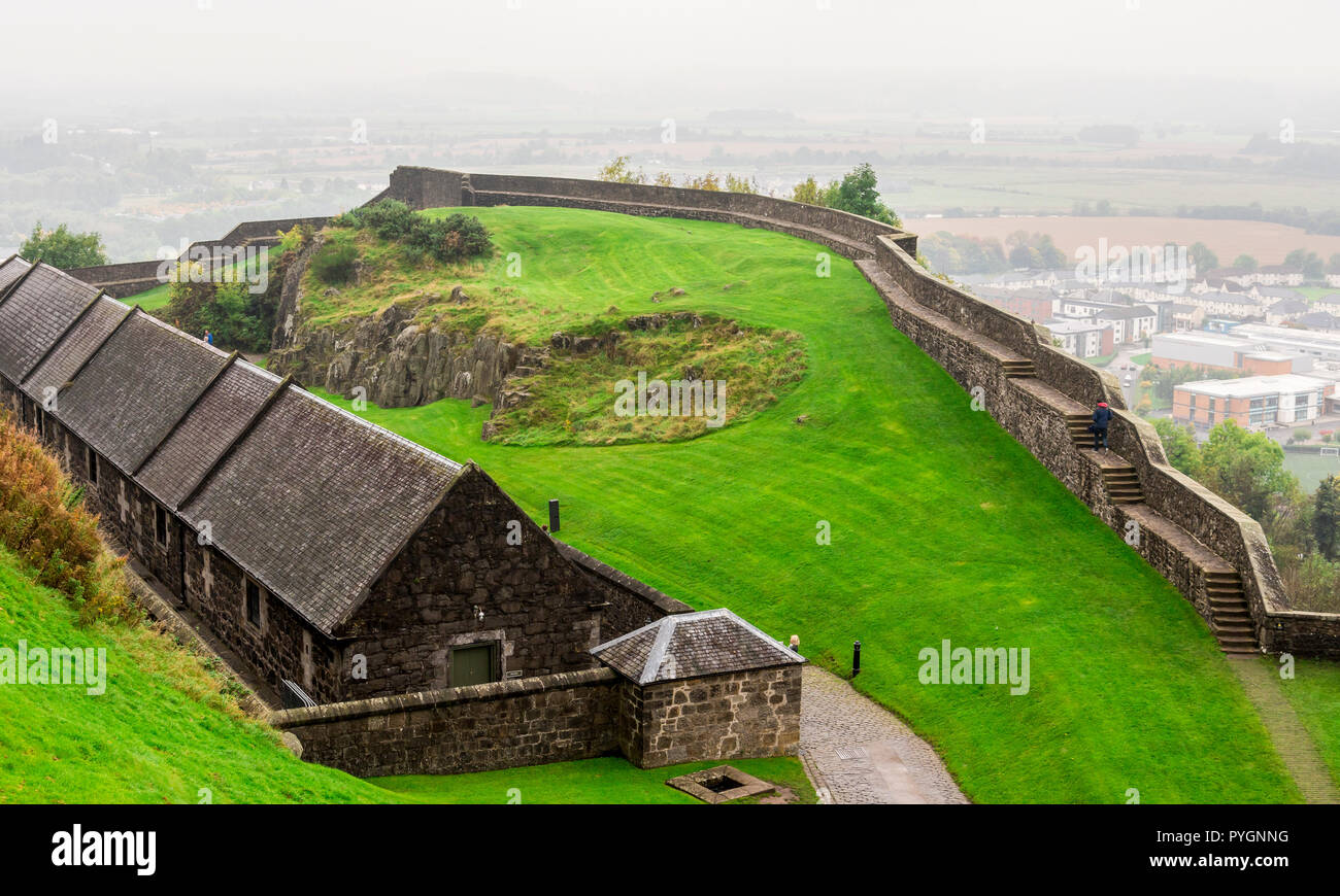 Stirling Castle yard with a green lawn, exhibition halls and stone ...