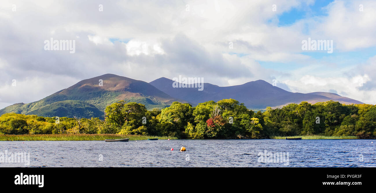Lake Killarney cruise with views of Killarney National Park Stock Photo ...