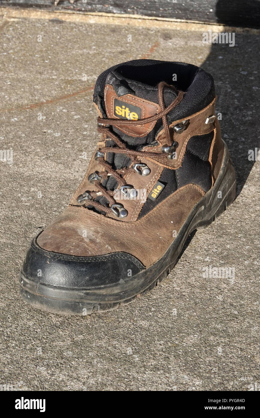 Old work boot Stock Photo - Alamy