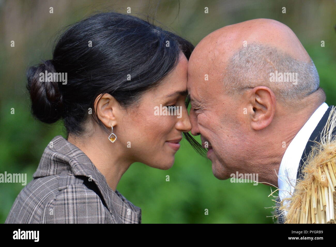 The Duchess of Sussex receives a hongi, a traditional Maori greeting ...