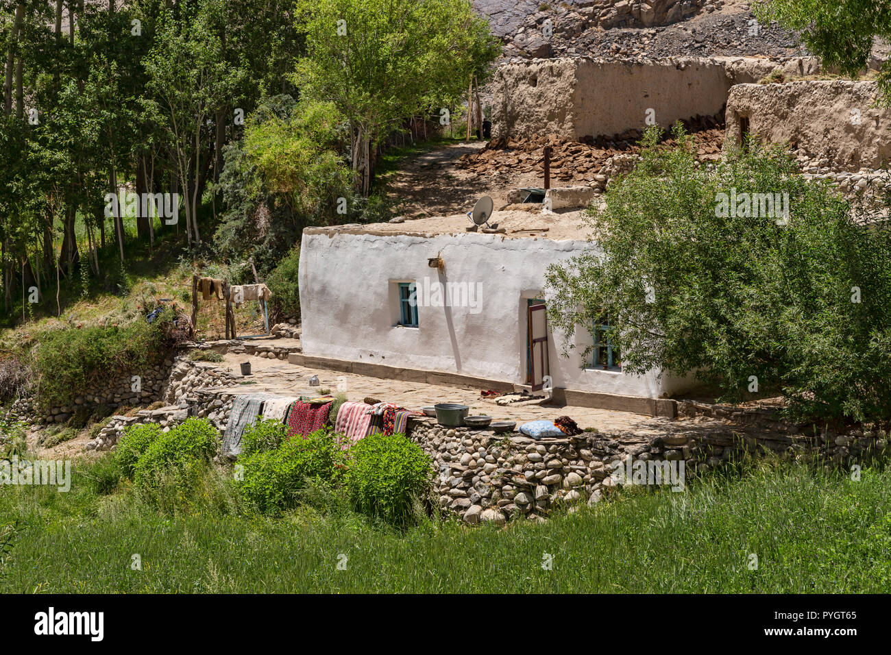 Pamiri white houses with blue doors hi-res stock photography and images ...