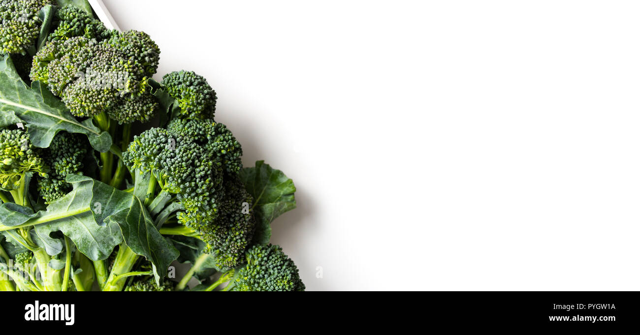 Broccoli in a box on white background top view Stock Photo - Alamy