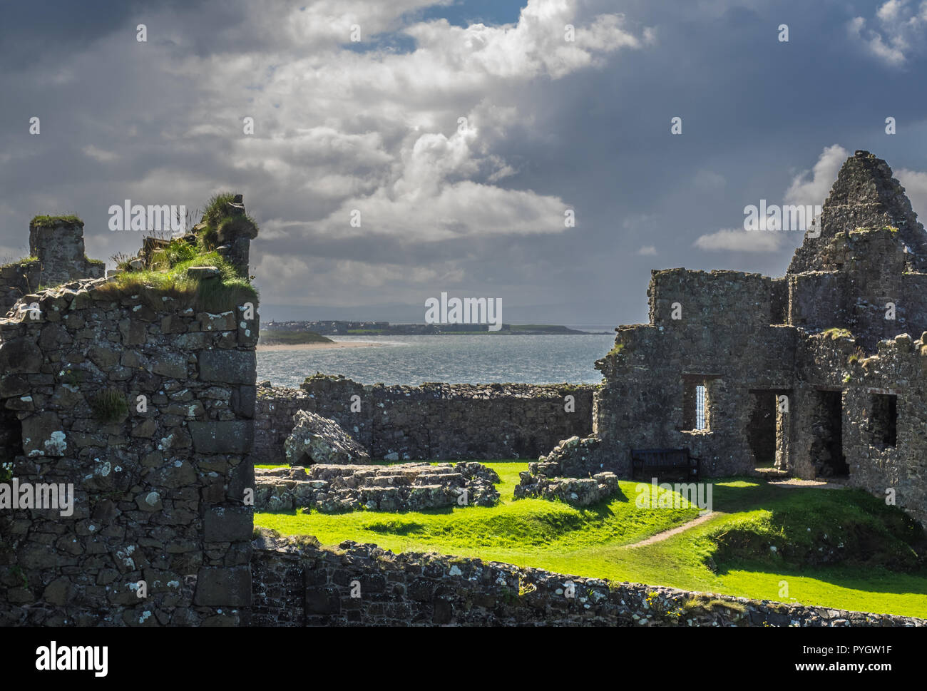 BUSHMILLS, NORTHER IRELAND - JULY 13, 2016 DUNLUCE CASTLE. .The ruins ...