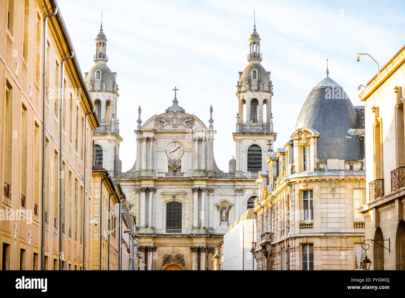 Street view with Notre-Dame cathedral during the morning light in Nancy ...