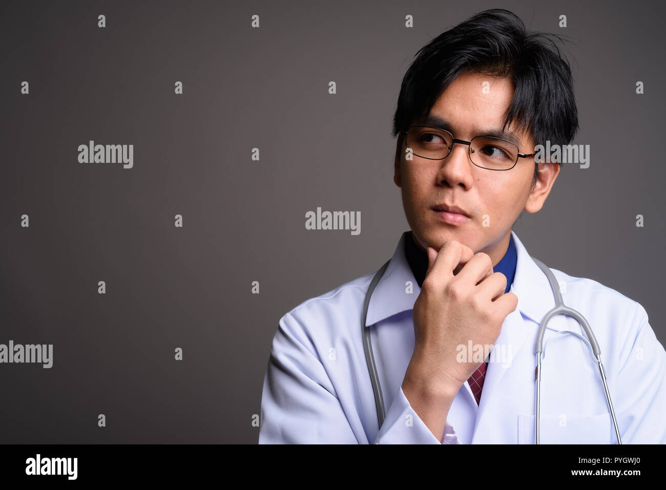Close up doctor thinking hi-res stock photography and images - Alamy