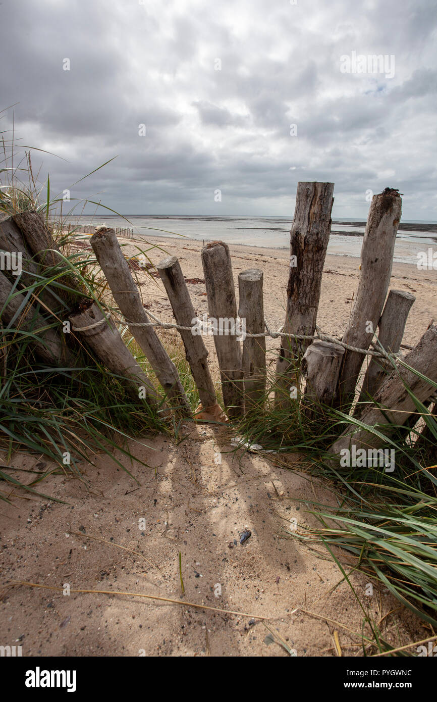 fence on Normandy beach Stock Photo - Alamy