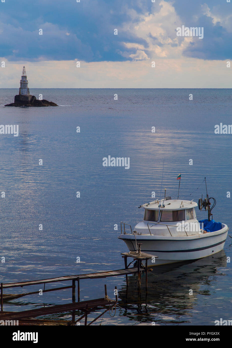 Beautiful landscape with boat in the sea Stock Photo - Alamy