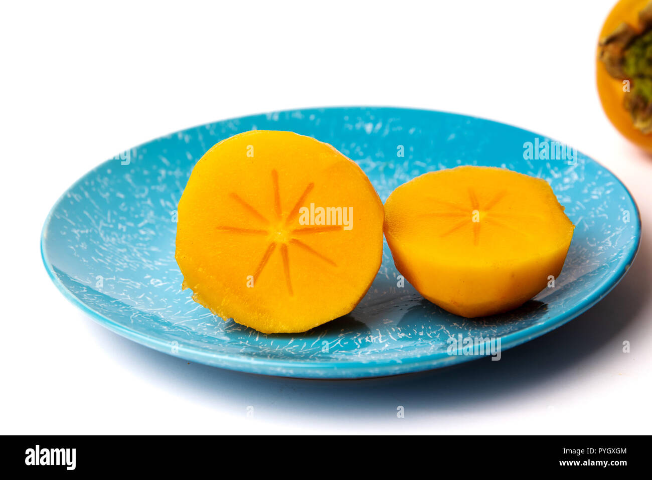 Slice persimmon hi-res stock photography and images - Alamy
