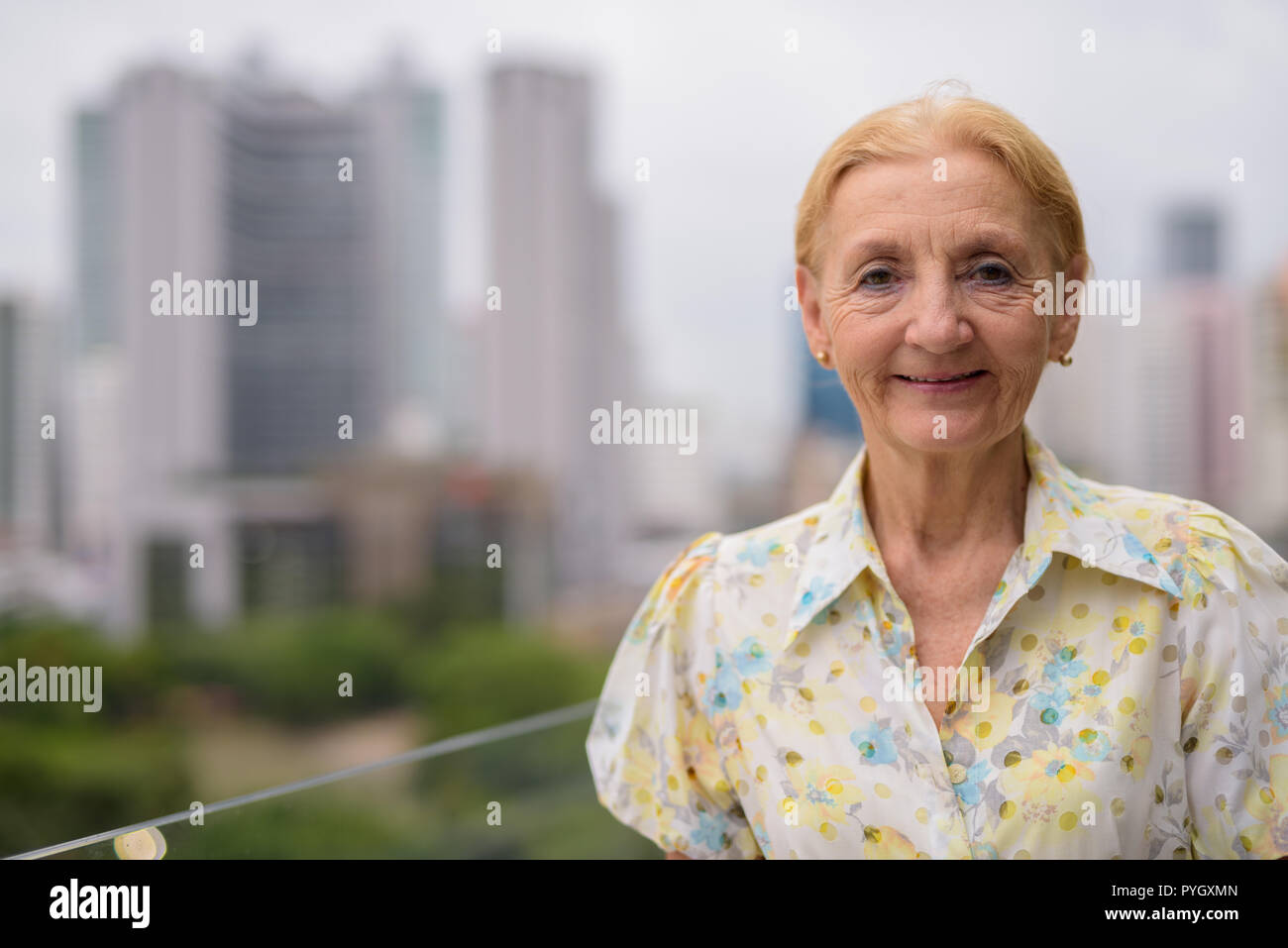 Happy smiling elderly senior woman hi-res stock photography and images ...