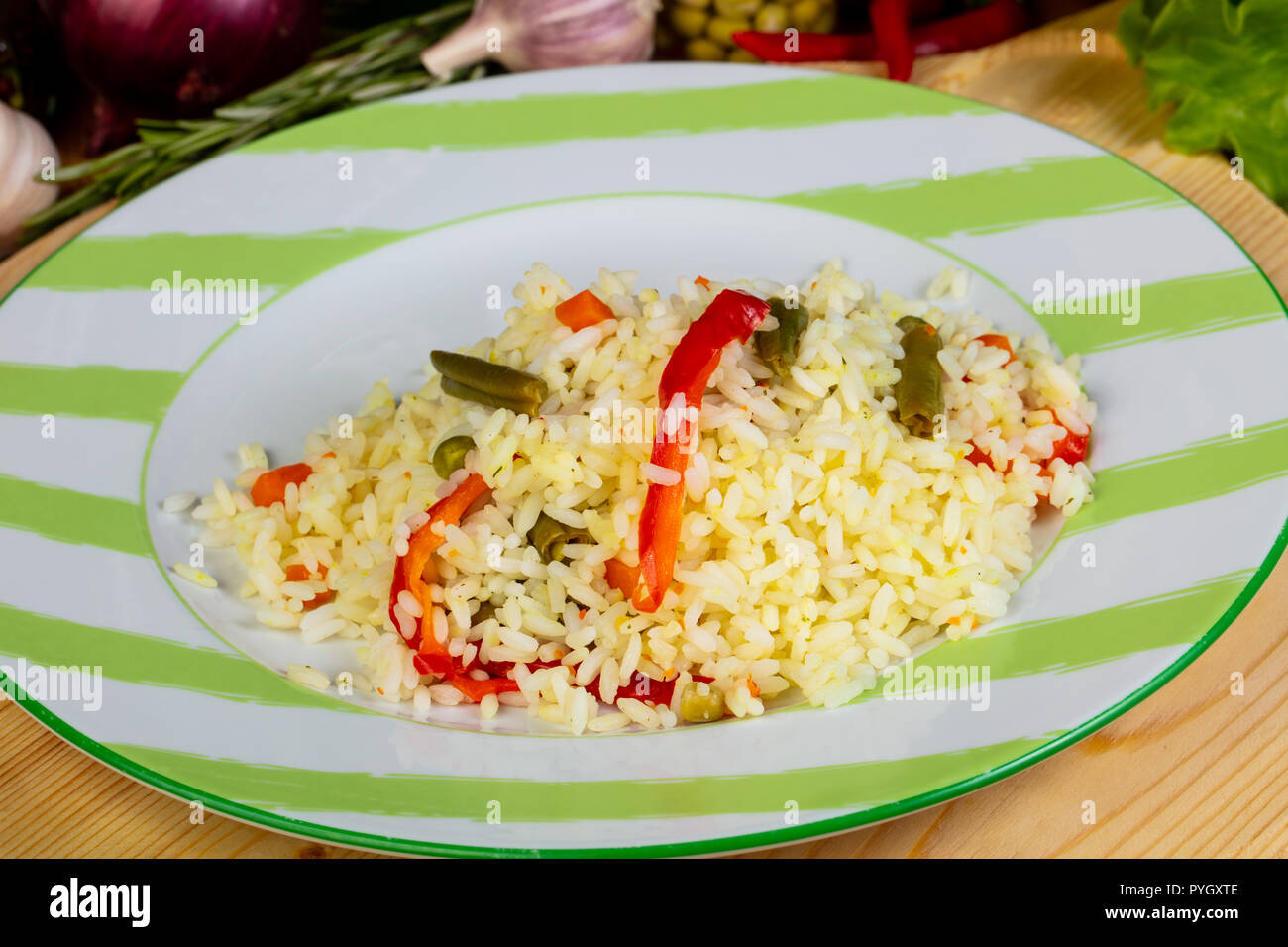 Steamed rice with vegetables in the plate Stock Photo - Alamy