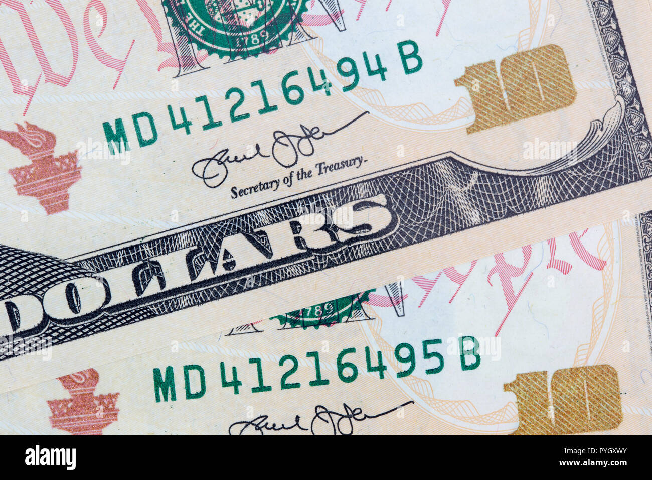 Ten dollars bills close up consecutive serial numbers Stock Photo - Alamy