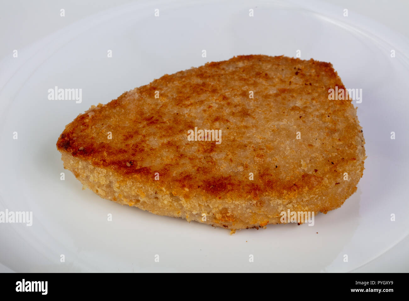 Roasted fish cutlet in the plate Stock Photo - Alamy
