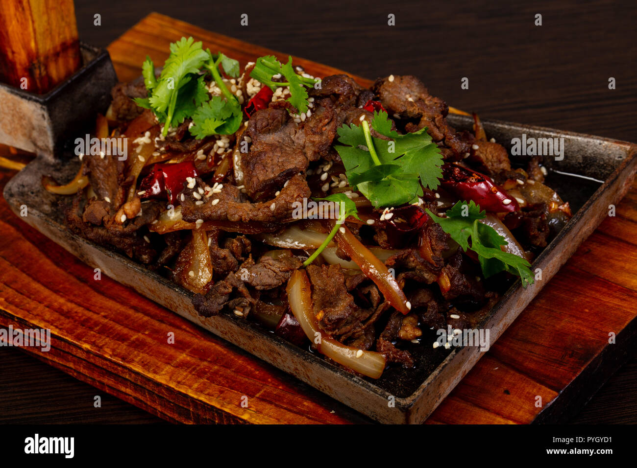 Chinese cuisine - Roasted beef in the pan Stock Photo - Alamy