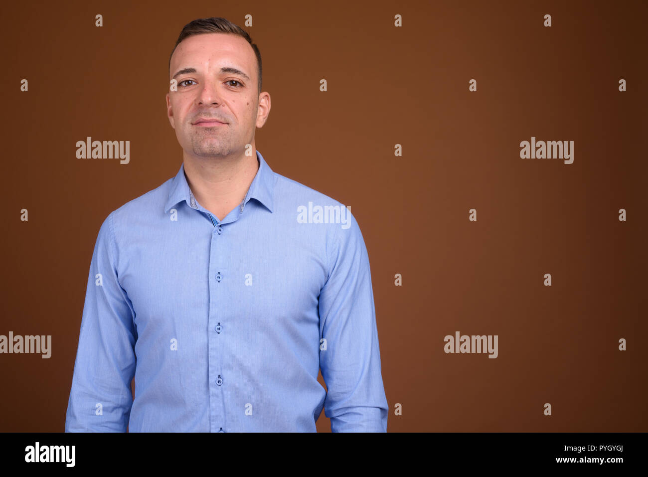 Wearing blue casual shirt for men hi-res stock photography and images ...