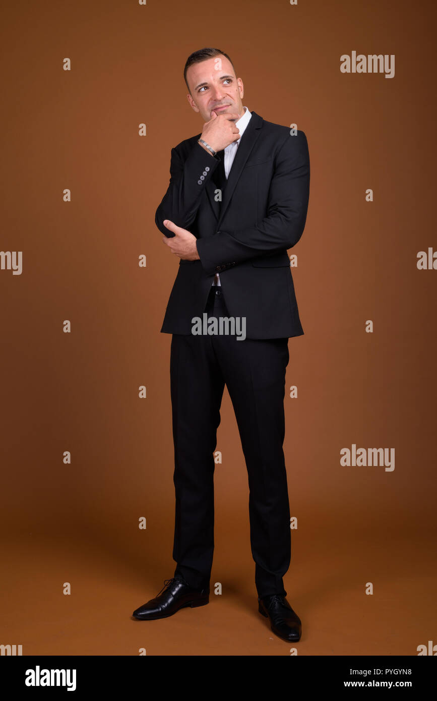 Businessman wearing full suit hi-res stock photography and images - Alamy