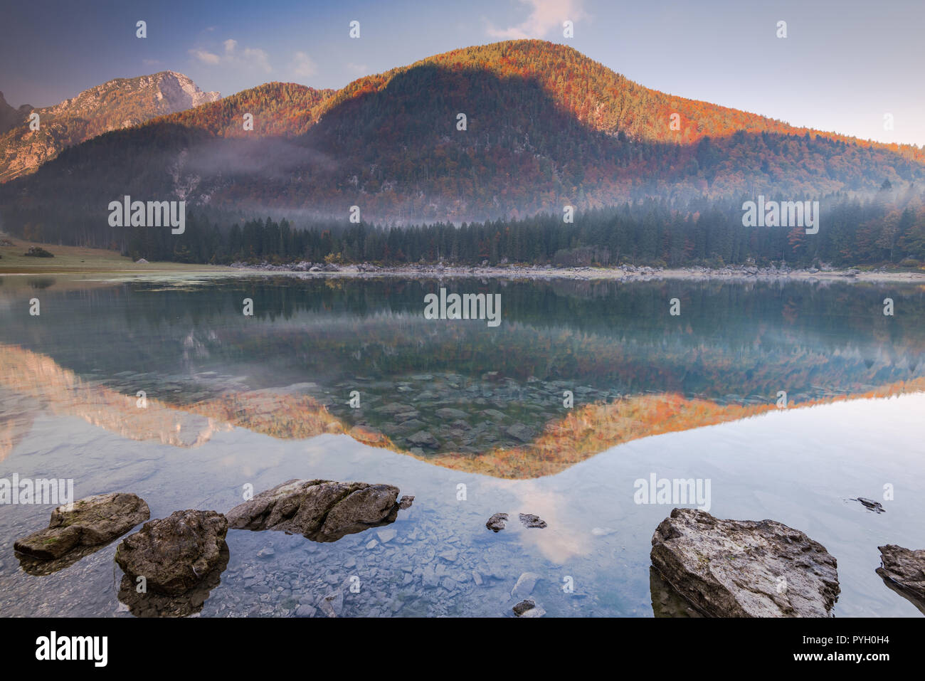 Fall autumnal lake reflection mist hi-res stock photography and images ...