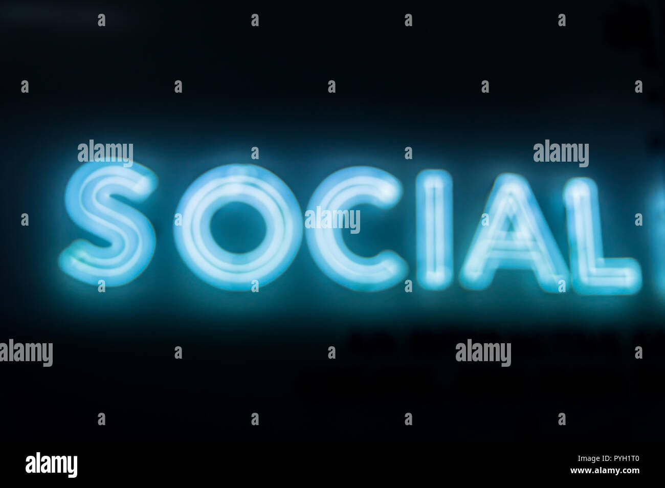 Neon Light of social,Abstract blurred photo of Social wording Stock ...