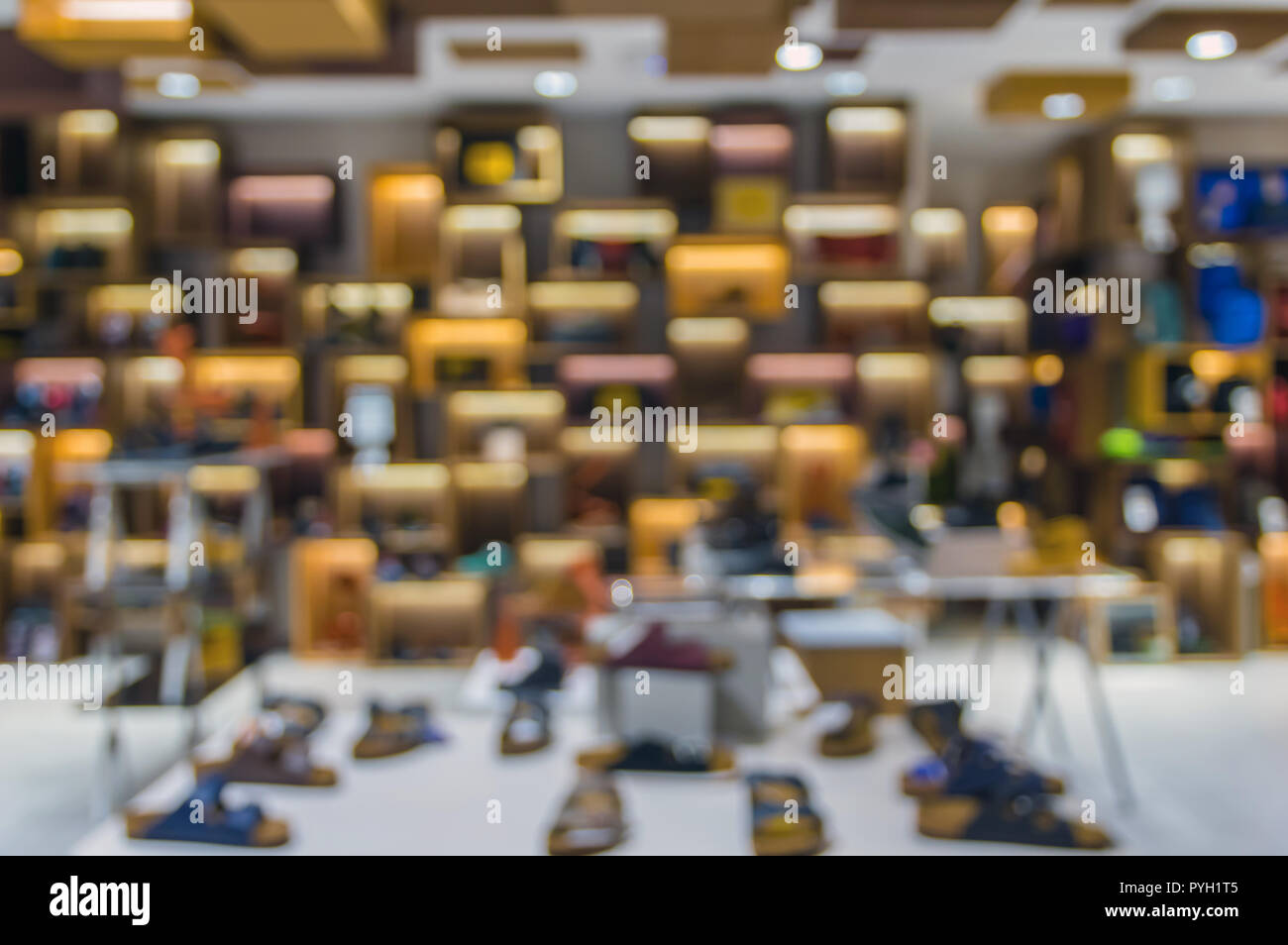 Abstract blurred photo of the bag and shoes store in a shopping mall ...