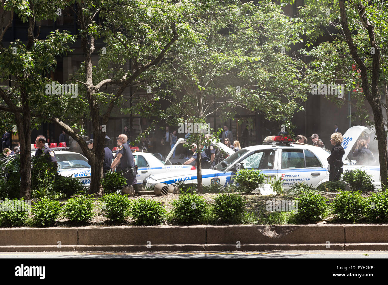 Wrecked police cars and film production crew, NYC, USA Stock Photo - Alamy
