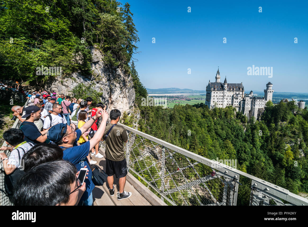 Tourists at the viewpoint on Neuschwanstein, Germany, Europe Stock ...