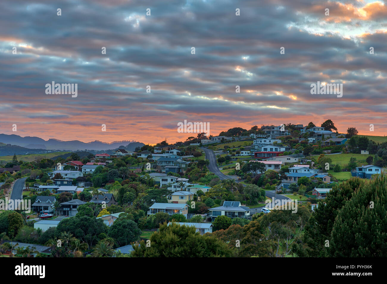 colorful sunrise over mangonui town in Northland, New Zealand Stock ...
