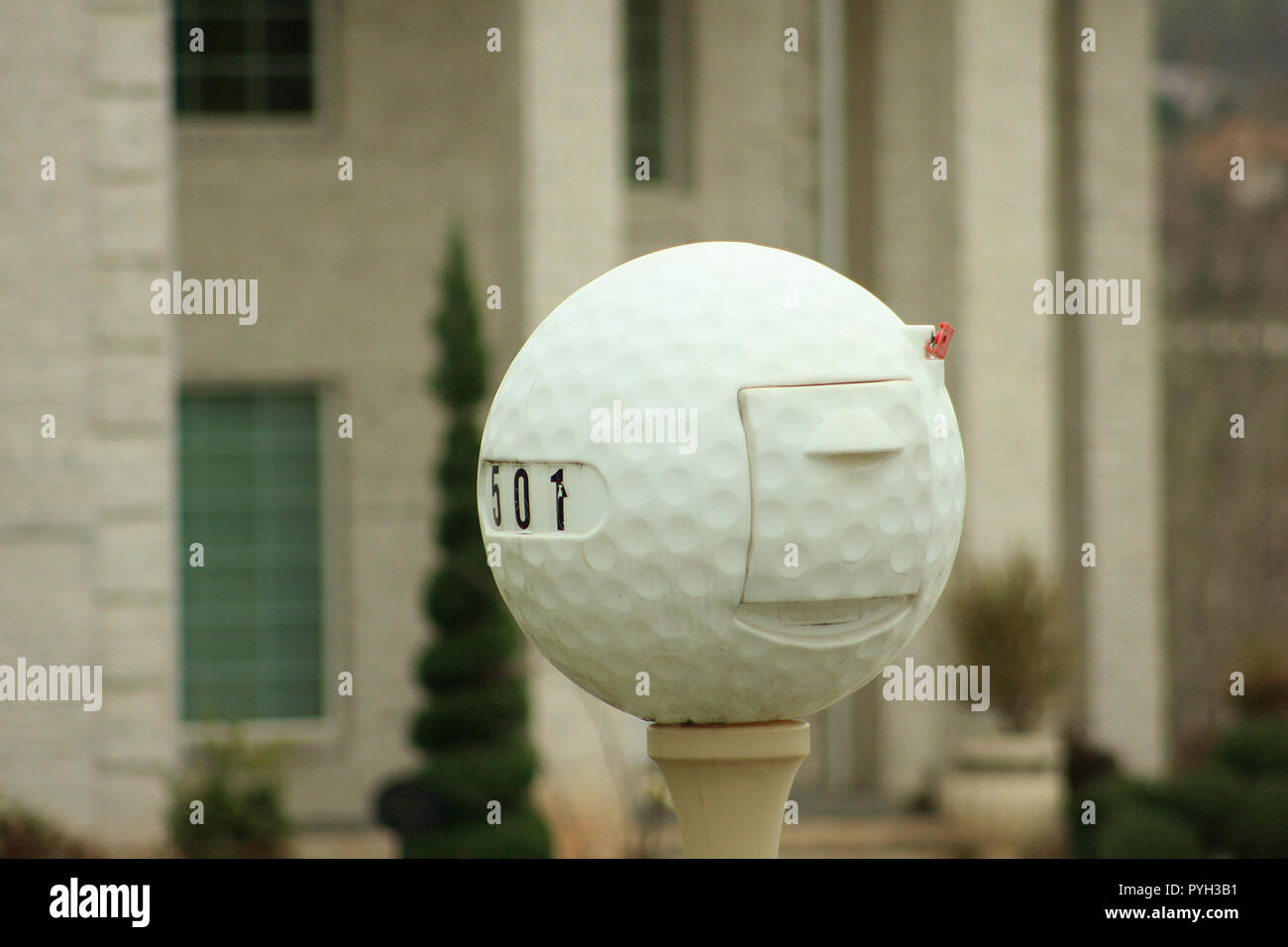 Original golf ball-shaped mailbox Stock Photo - Alamy