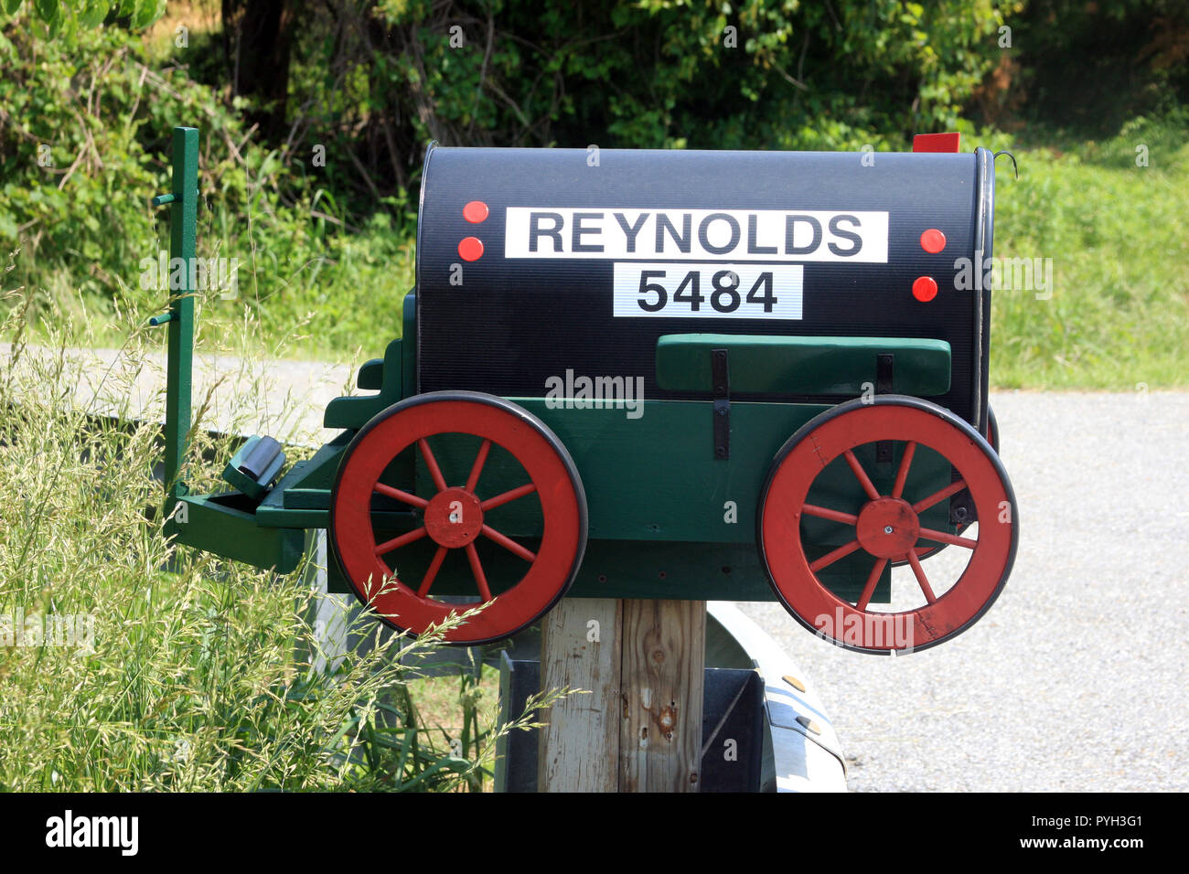 Old wagon- shaped mailbox Stock Photo - Alamy