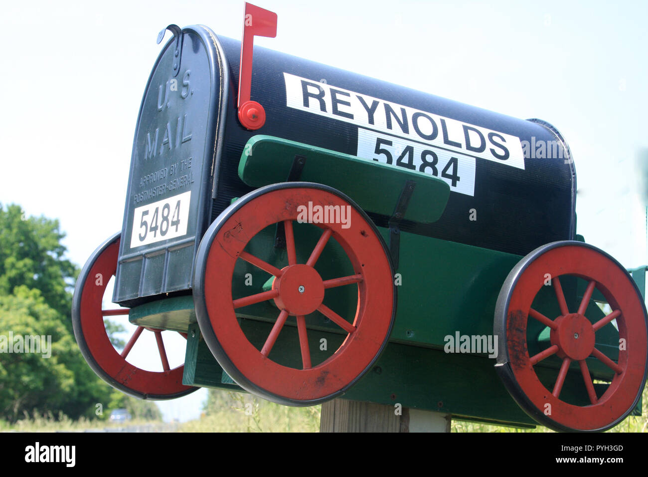 Old wagon- shaped mailbox Stock Photo - Alamy
