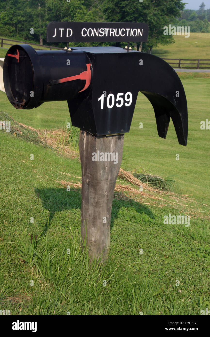 Original mailbox shaped like a hammer Stock Photo - Alamy