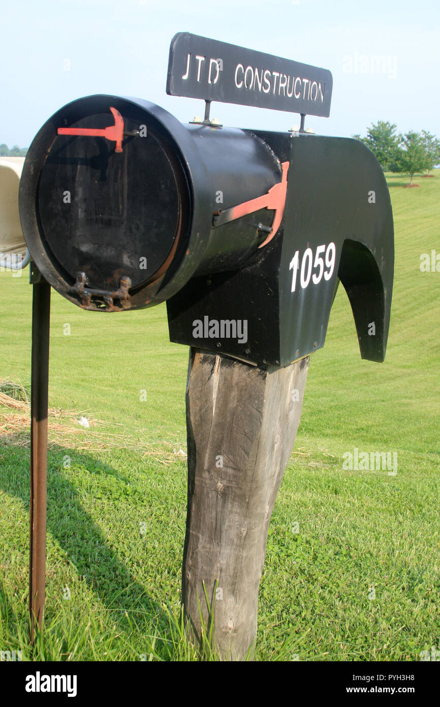 Original mailbox shaped like a hammer Stock Photo - Alamy