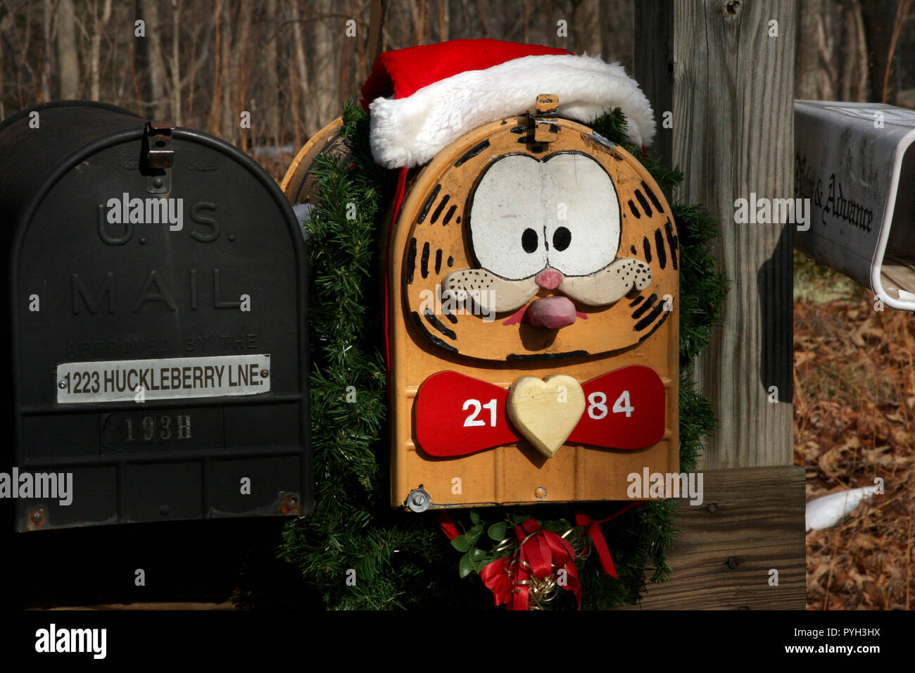 Funny looking mailbox decorated for Christmas Stock Photo - Alamy