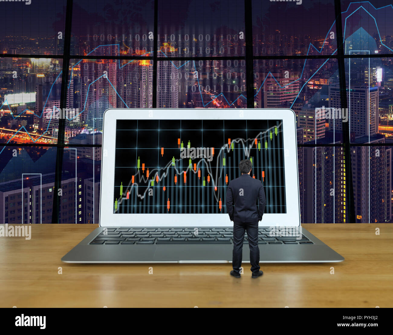 Businessman standing on the wood table which have the computer laptop ...
