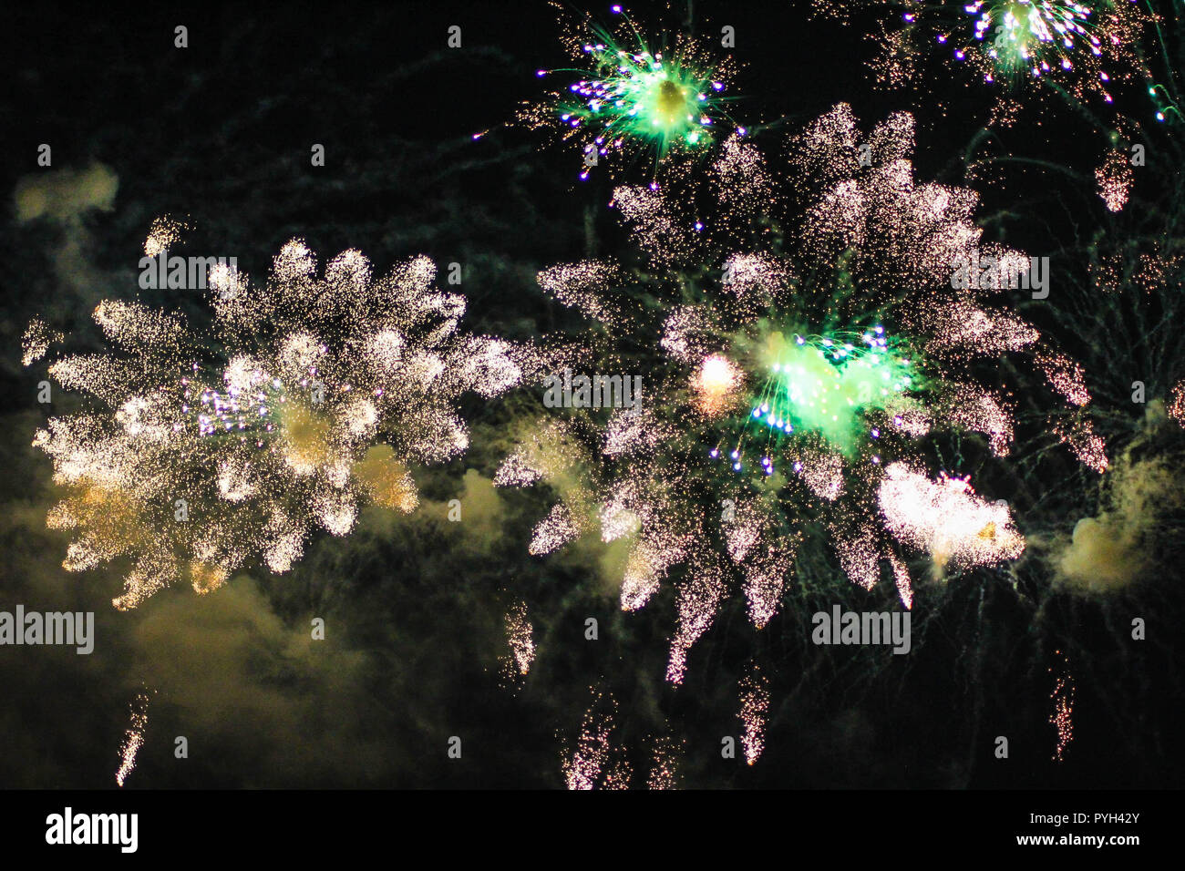 Fireworks on the black sky. Festive show. Large-scale celebration. The ...