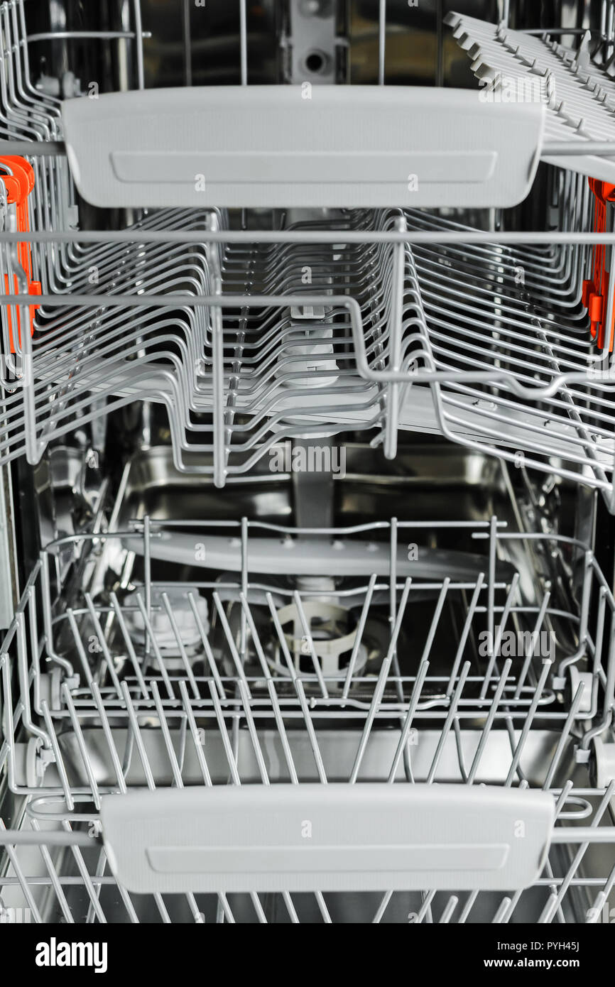 Open empty dishwasher, close up. Home appliances Stock Photo - Alamy