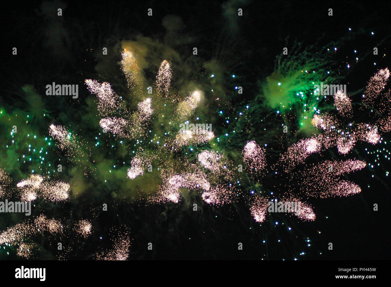 Fireworks on the black sky. Festive show. Large-scale celebration. The ...